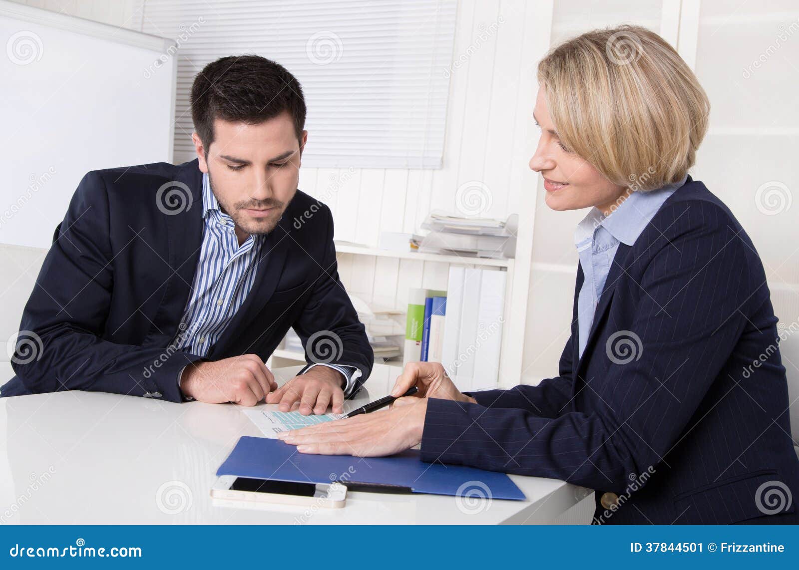 Interview with Manager and Young Attractive Man at Office. Stock Image ...