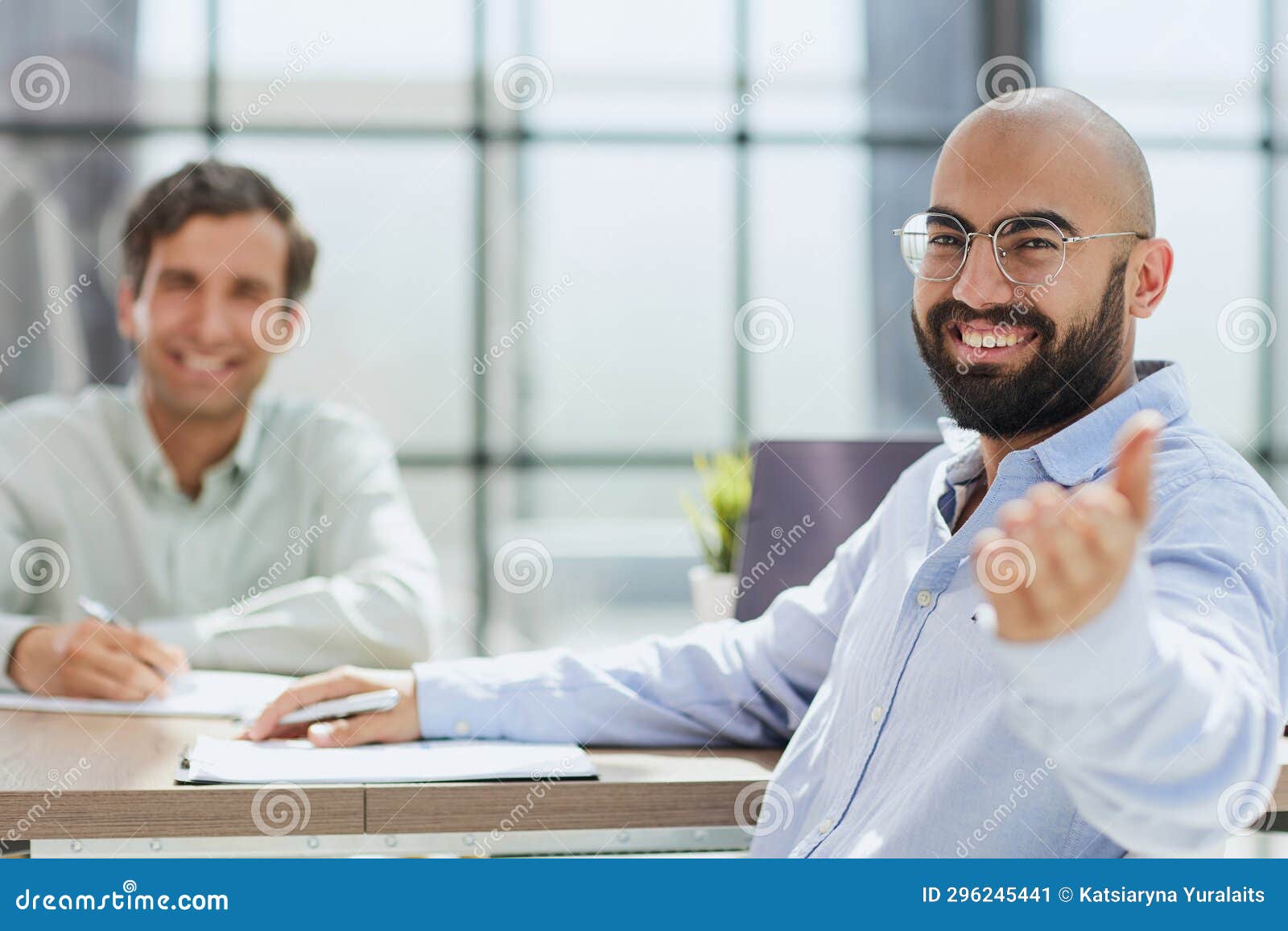 Interview in the Office. Two Young Men Smile Stock Image - Image of ...