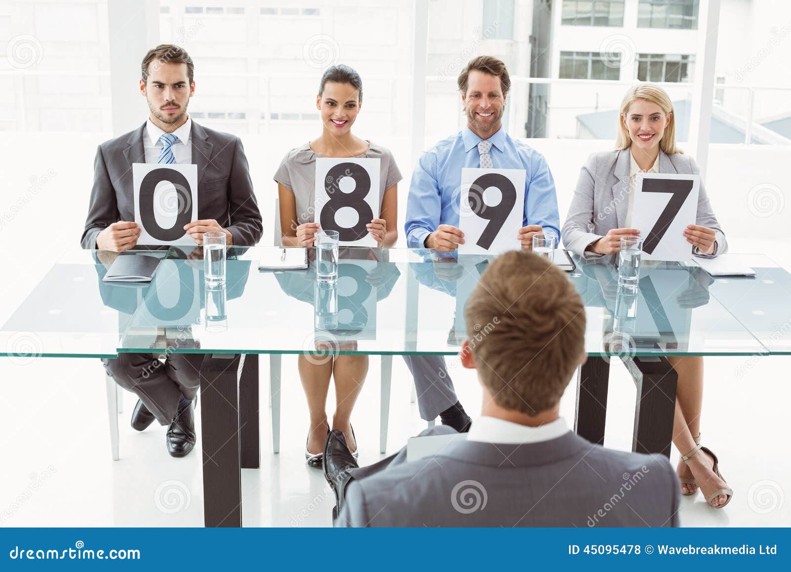 Interview Panel Holding Score Cards in Office Stock Photo - Image of ...