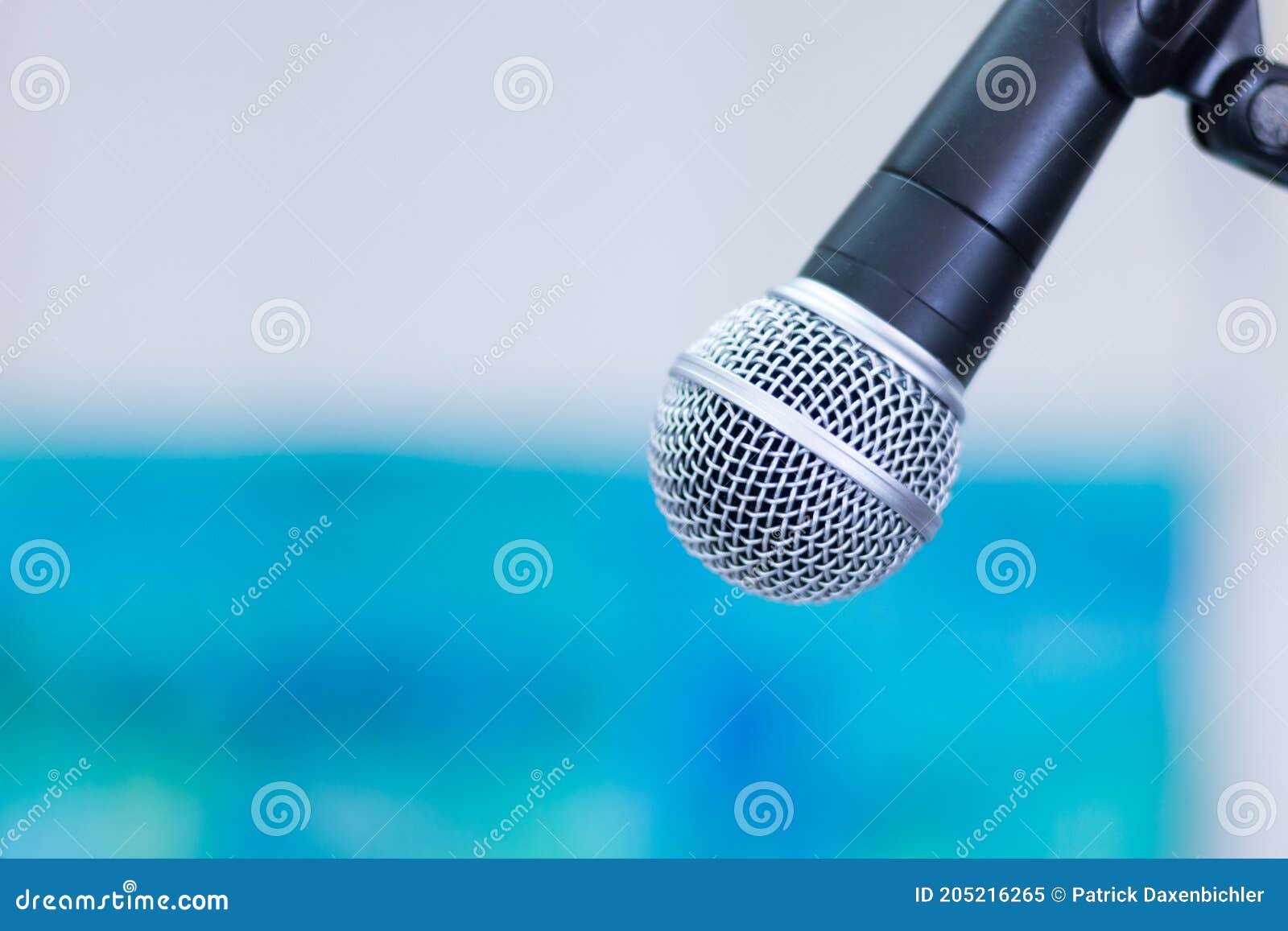 Interview Situation: Black Microphone on Tripod, Blurry Background ...