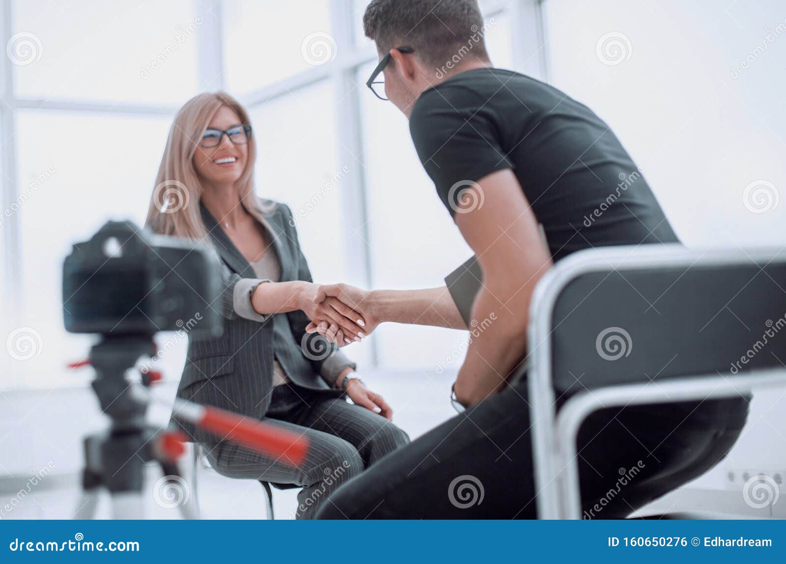 Interviewer Welcomes the Guest To the Studio Stock Photo - Image of ...