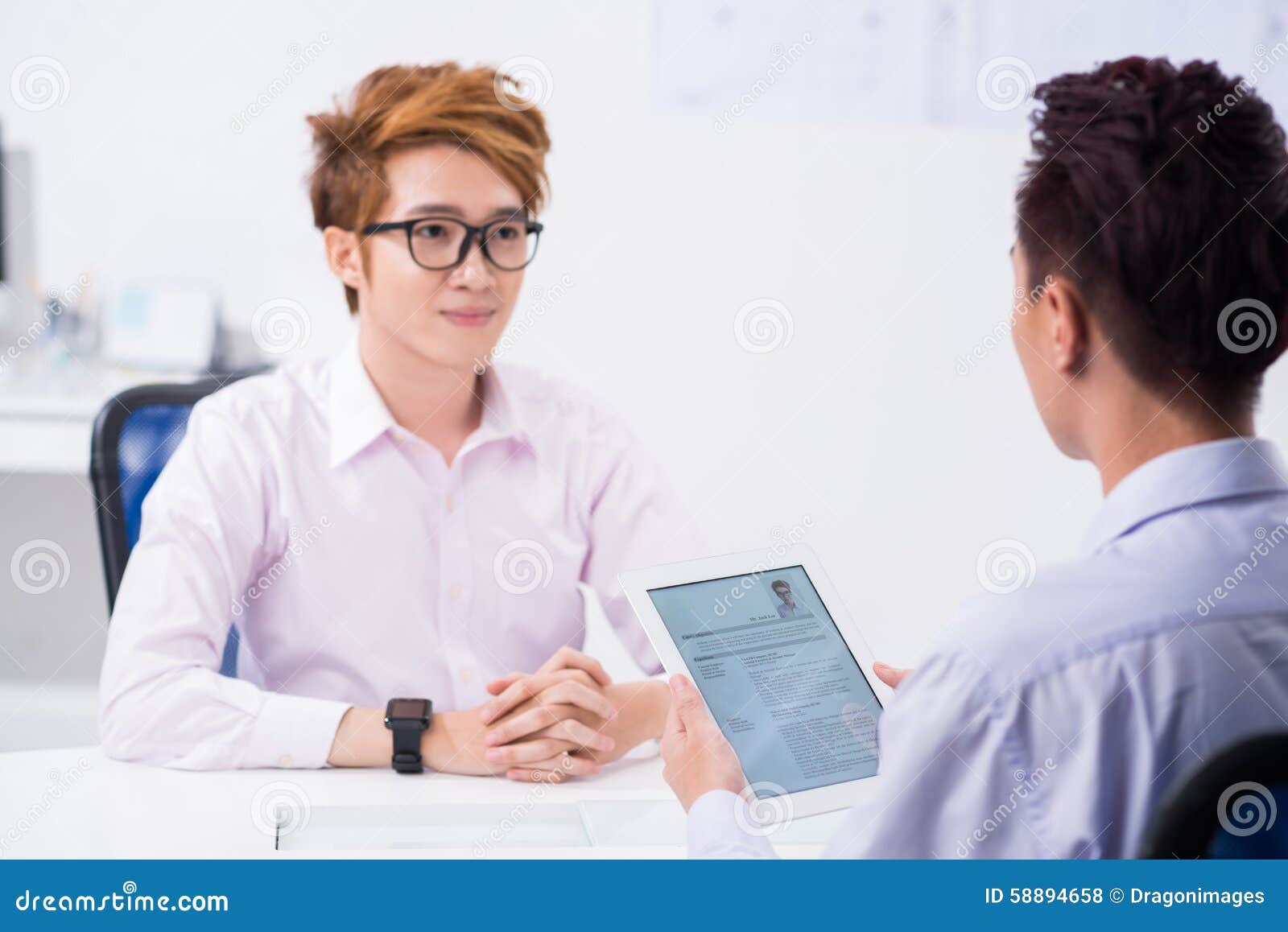 Interviewing applicant stock photo. Image of technology - 58894658