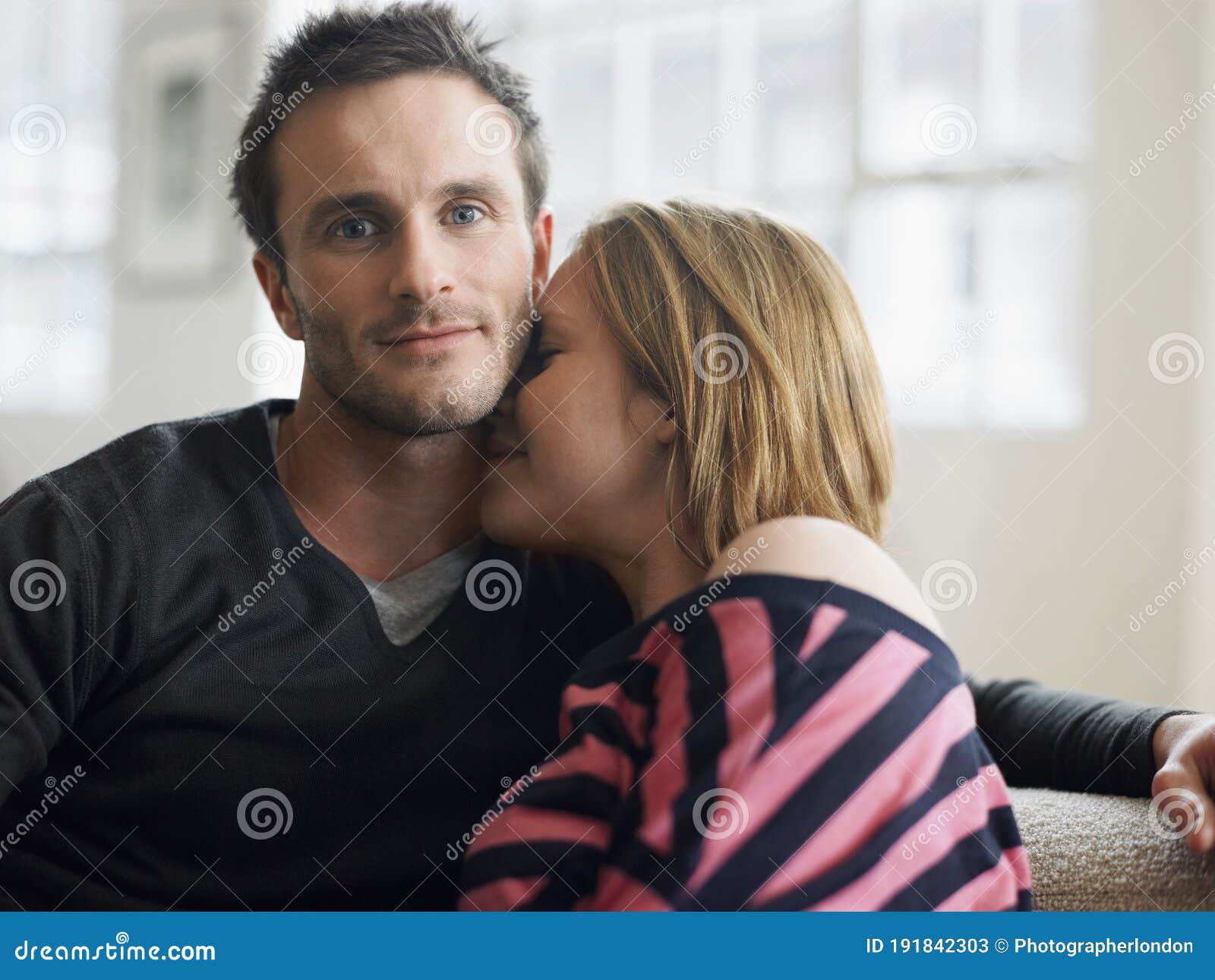 Portrait of Intimate Young Couple on Couch Stock Image - Image of ...