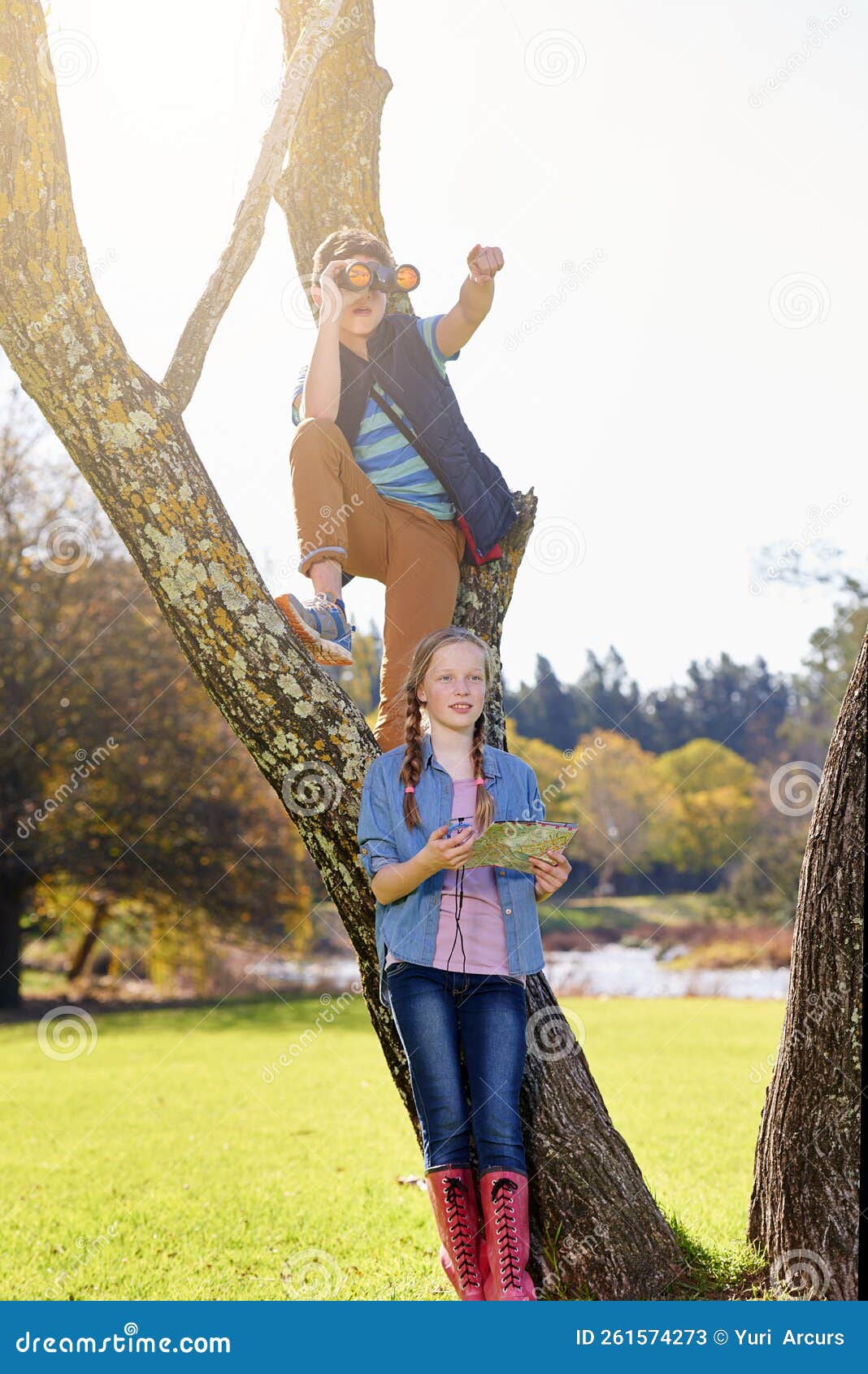 Intrepid Explorers. Two Young Friends with Binoculars and a Map ...