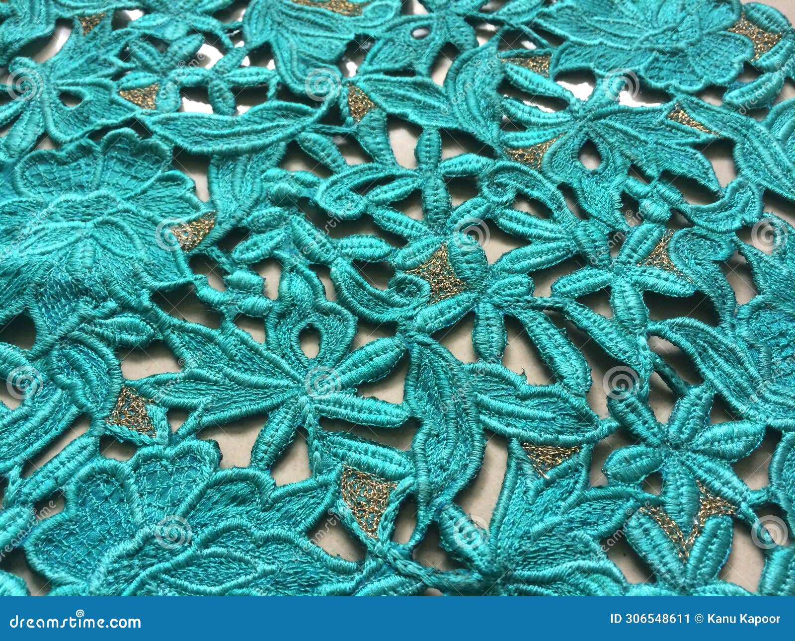 Intricate Blue Floral Cutwork Embroidery Self-Embroidery Fabric Stock ...