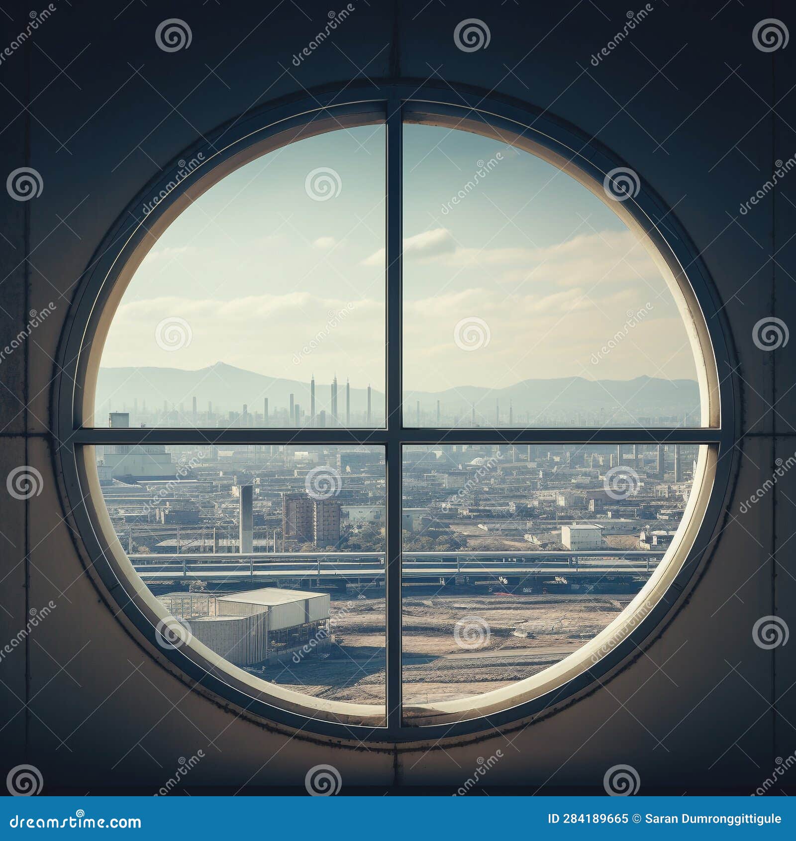 Overlooking a Bustling Manufacturing Plant through a Circular Window ...