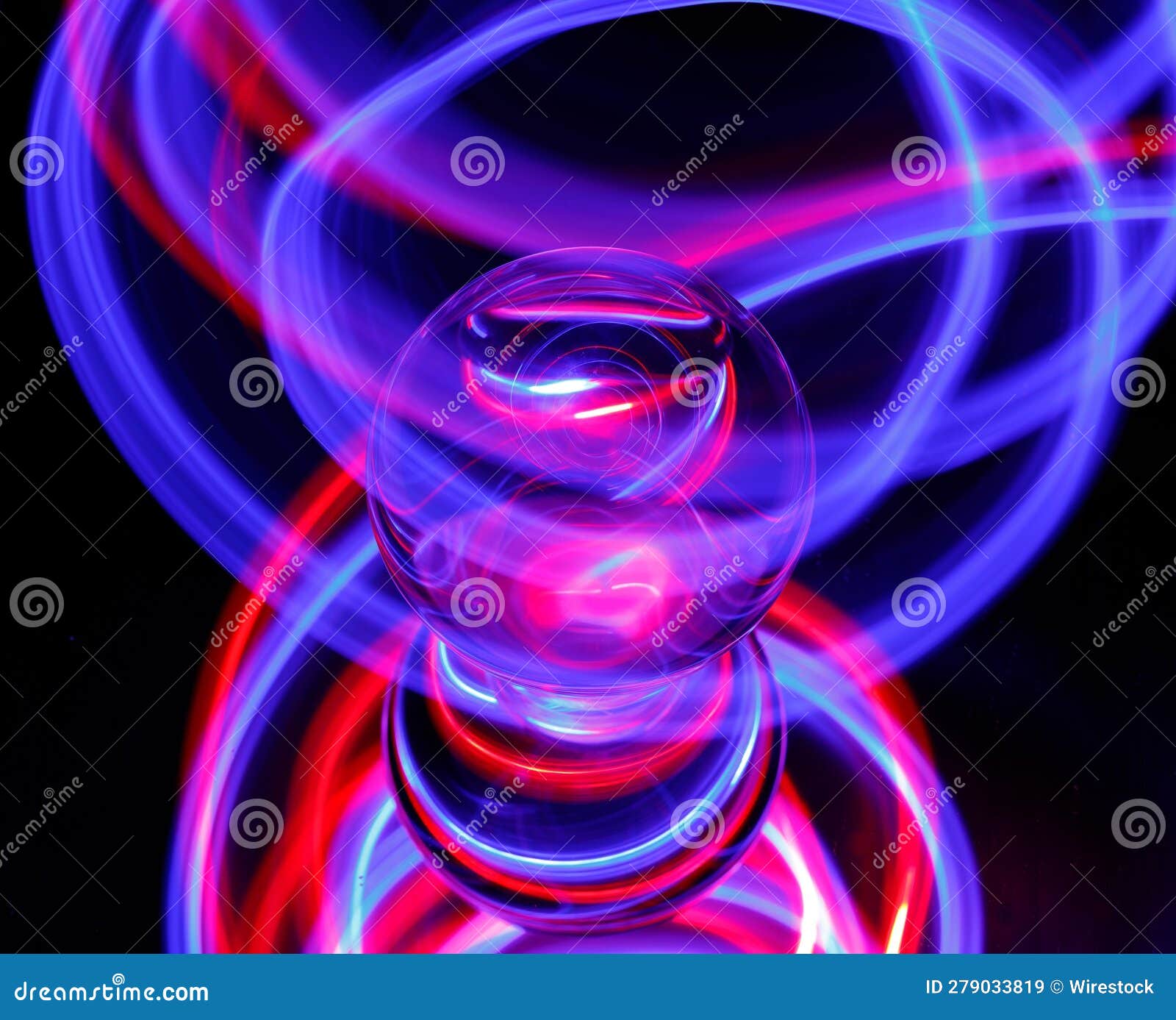 Intriguing Red and Purple Light Emanating from a Light Bulb in a Dimly ...