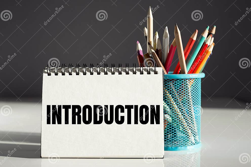 INTRODUCTION - Inscription on a Notebook with Colored Pencils Stock ...