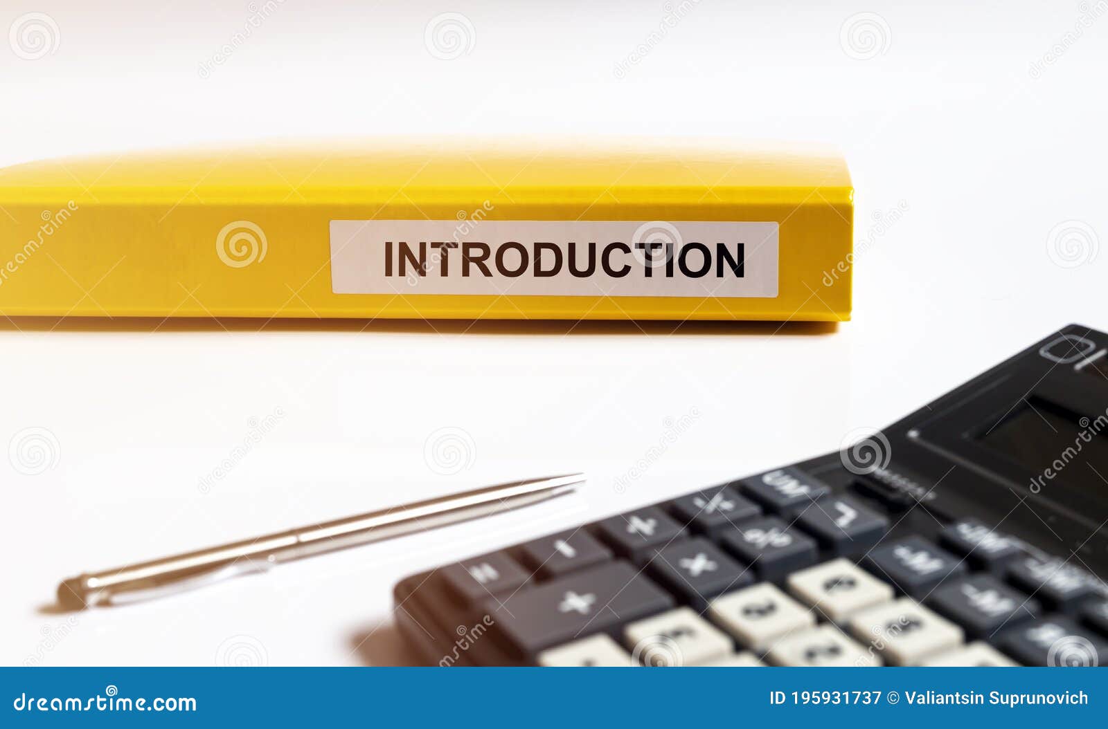 Introduction Word on Folder on Office Table with Calculator Stock Image ...