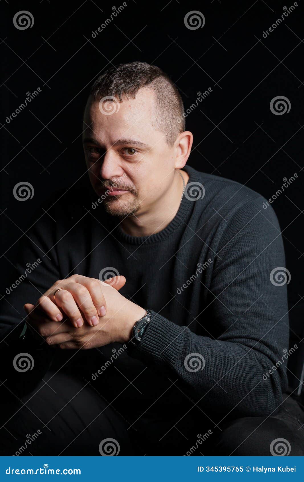 Introspective Man Reflecting Deep Emotions in Shadowy Light Stock Image ...