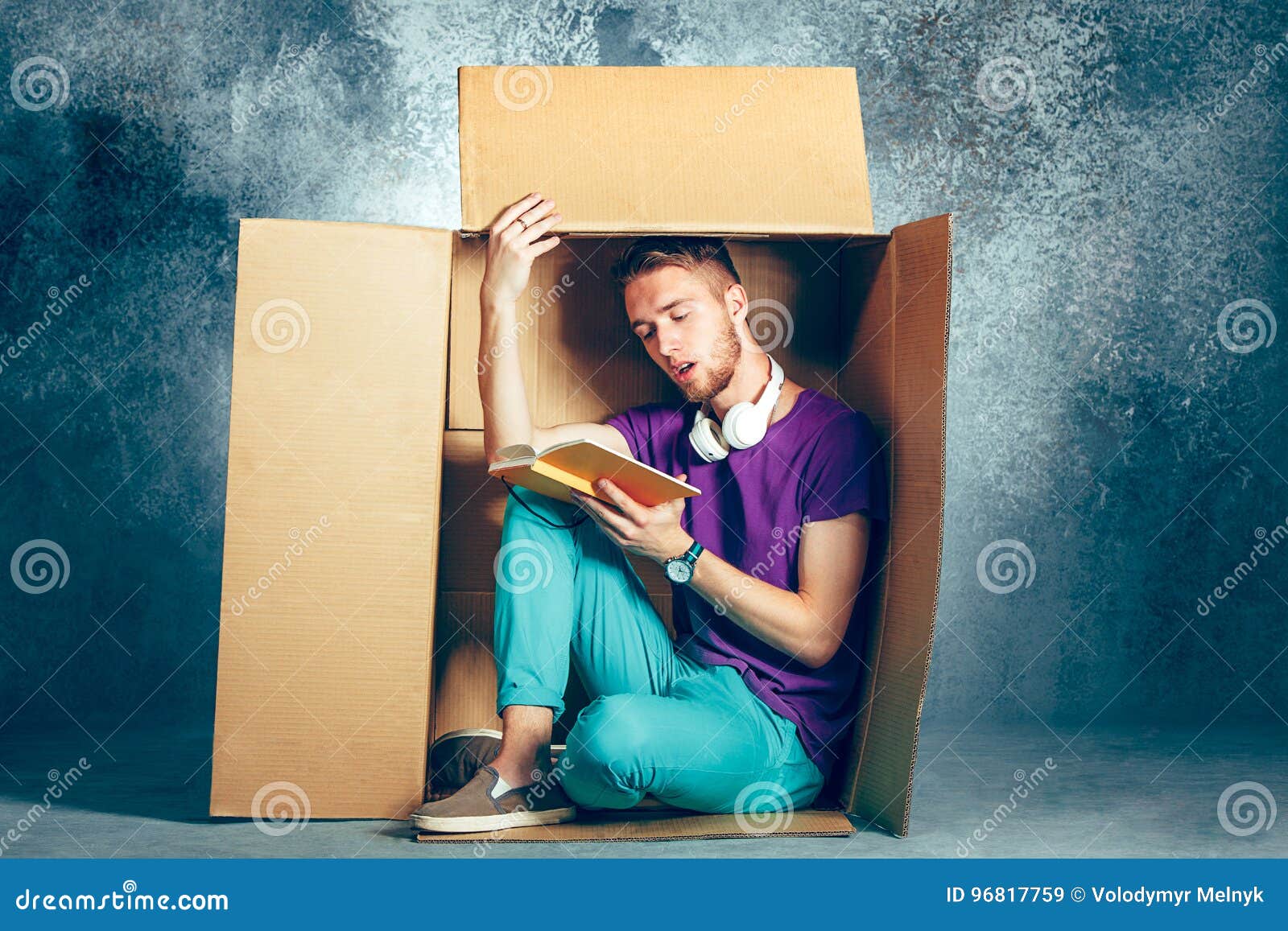 Introvert Concept. Man Sitting Inside Box and Reading Book Stock Image ...