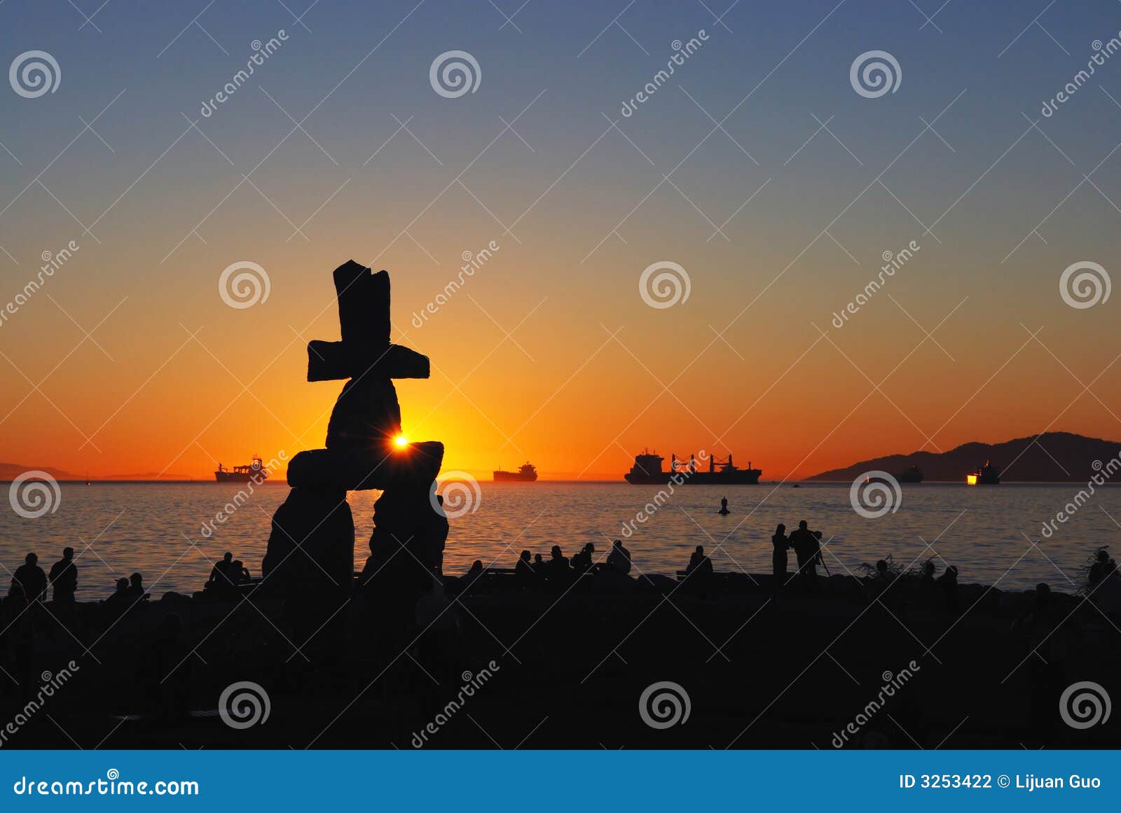 Inukshuk Sculpture at Sunset Stock Photo - Image of scene, island: 3253422