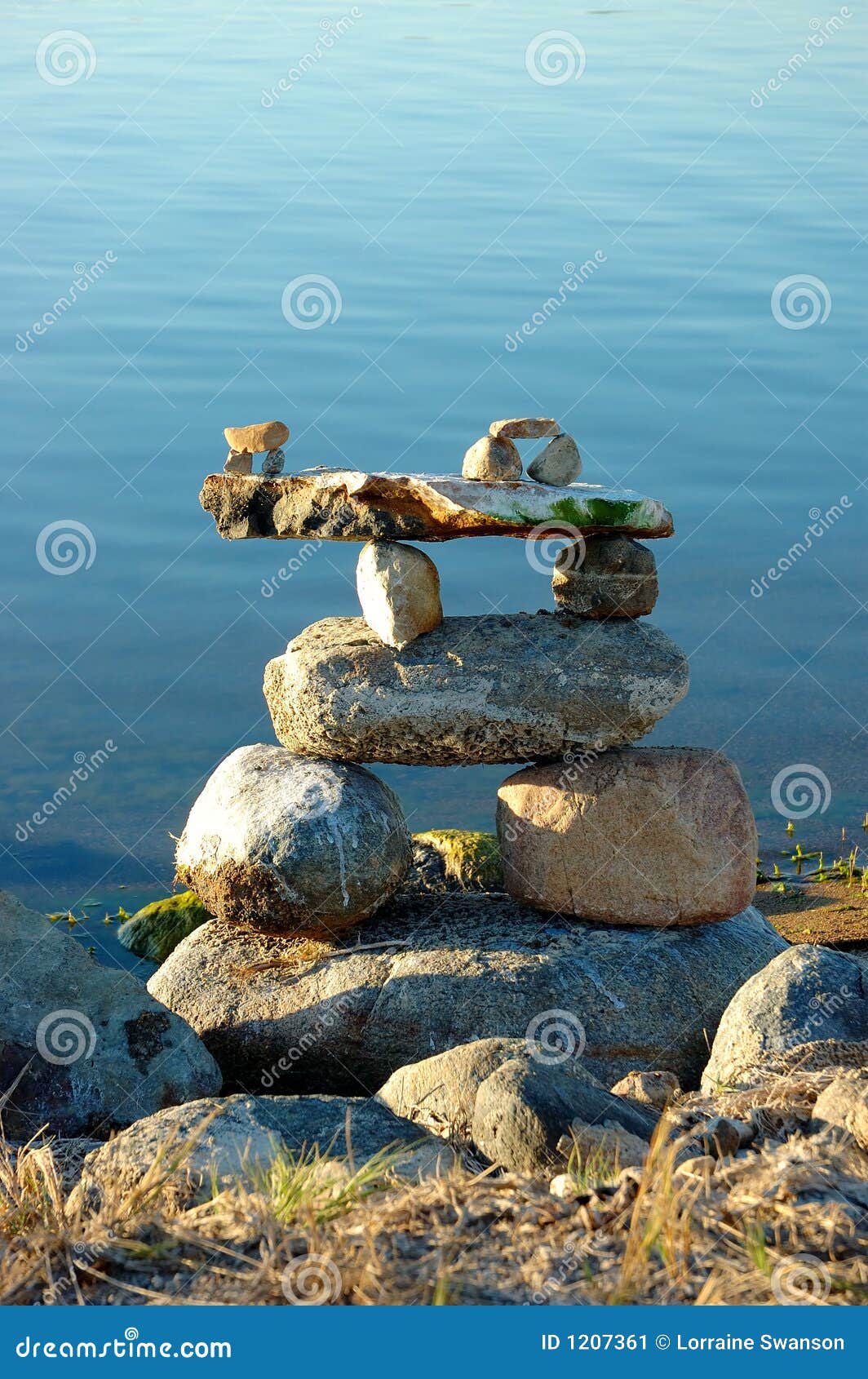 Inukshuk on water edge stock image. Image of inuit, relax - 1207361