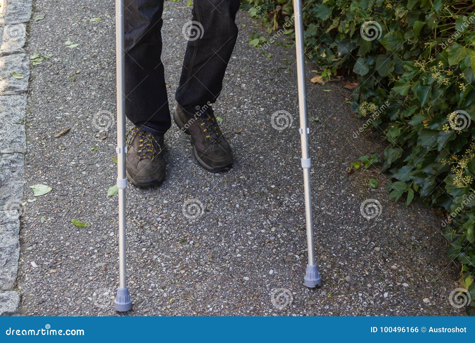 An Invalid Person with His Crutches Stock Photo - Image of challenged ...