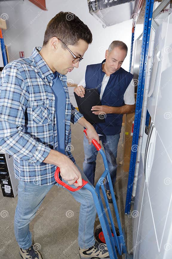 Inventory Clerk Inspecting Delivery Stock Image - Image of people ...