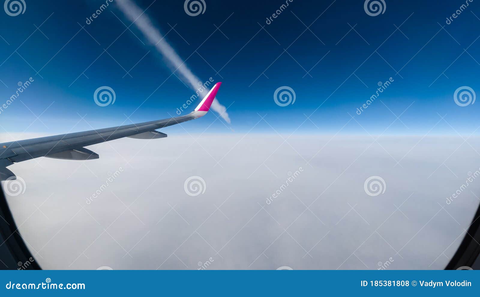 Inversion Trail of an Airplane Above the Clouds Stock Photo - Image of ...