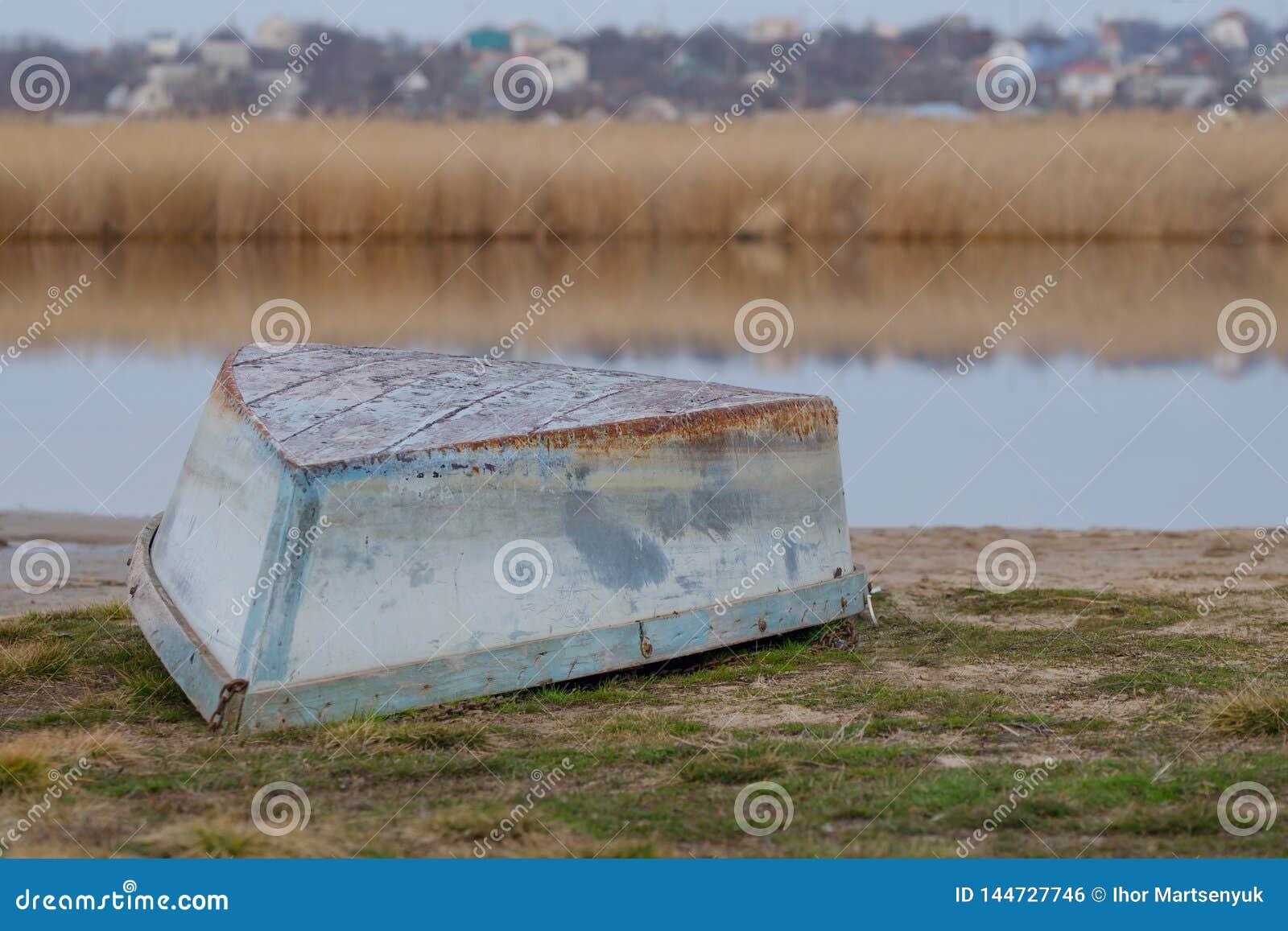 An Inverted Boat On A Concrete Embankment Stock Photo | CartoonDealer ...