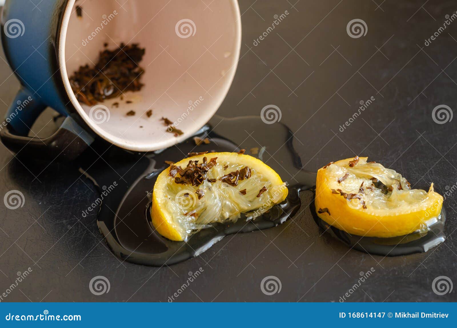 Inverted Cup of Tea on a Dark Table. Stock Image - Image of lemon ...