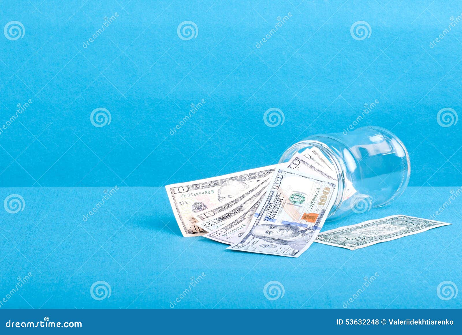 The Inverted Glass Jar with Dollar Bills, Side View Stock Photo - Image ...