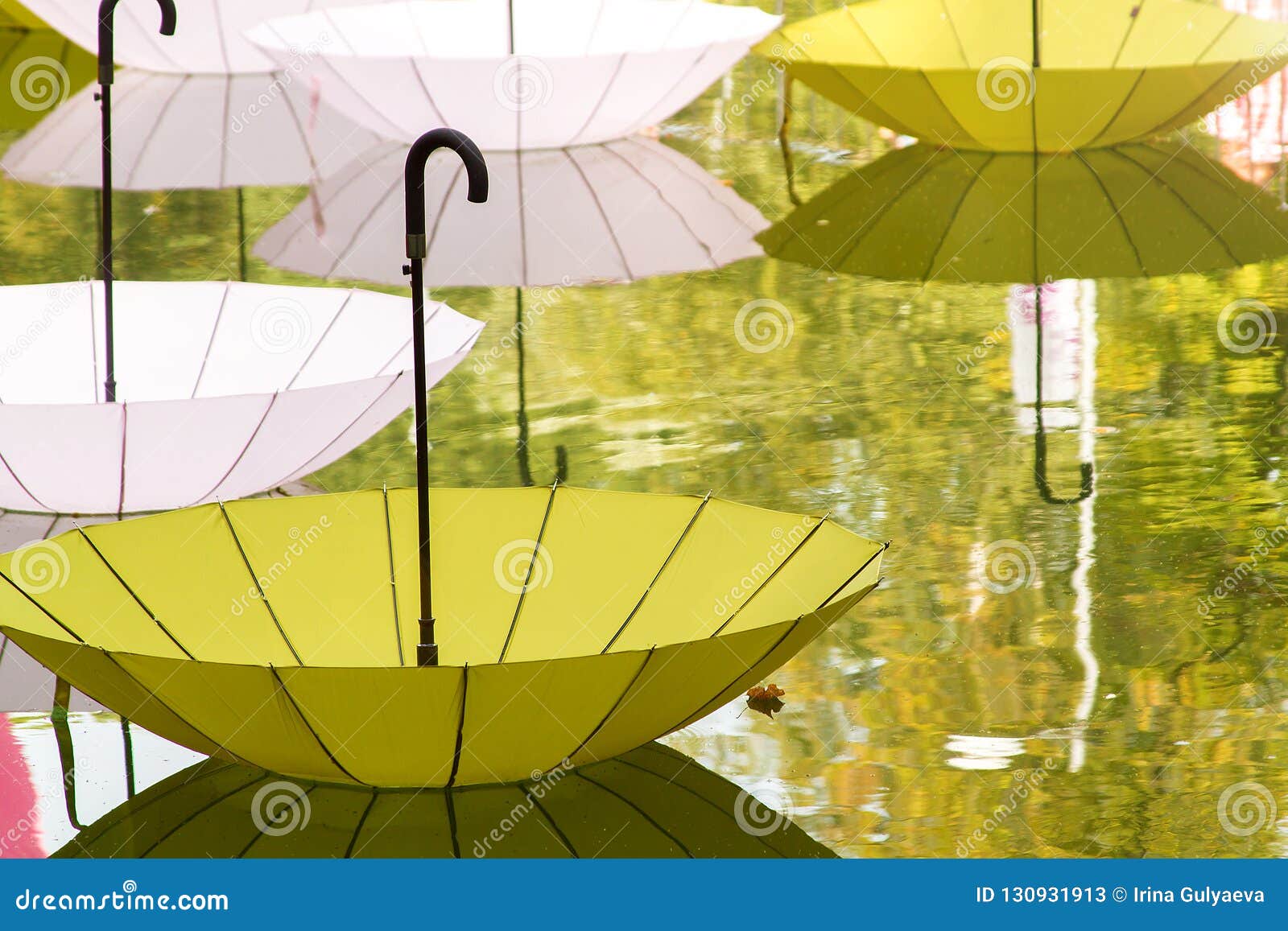Floating ground umbrellas