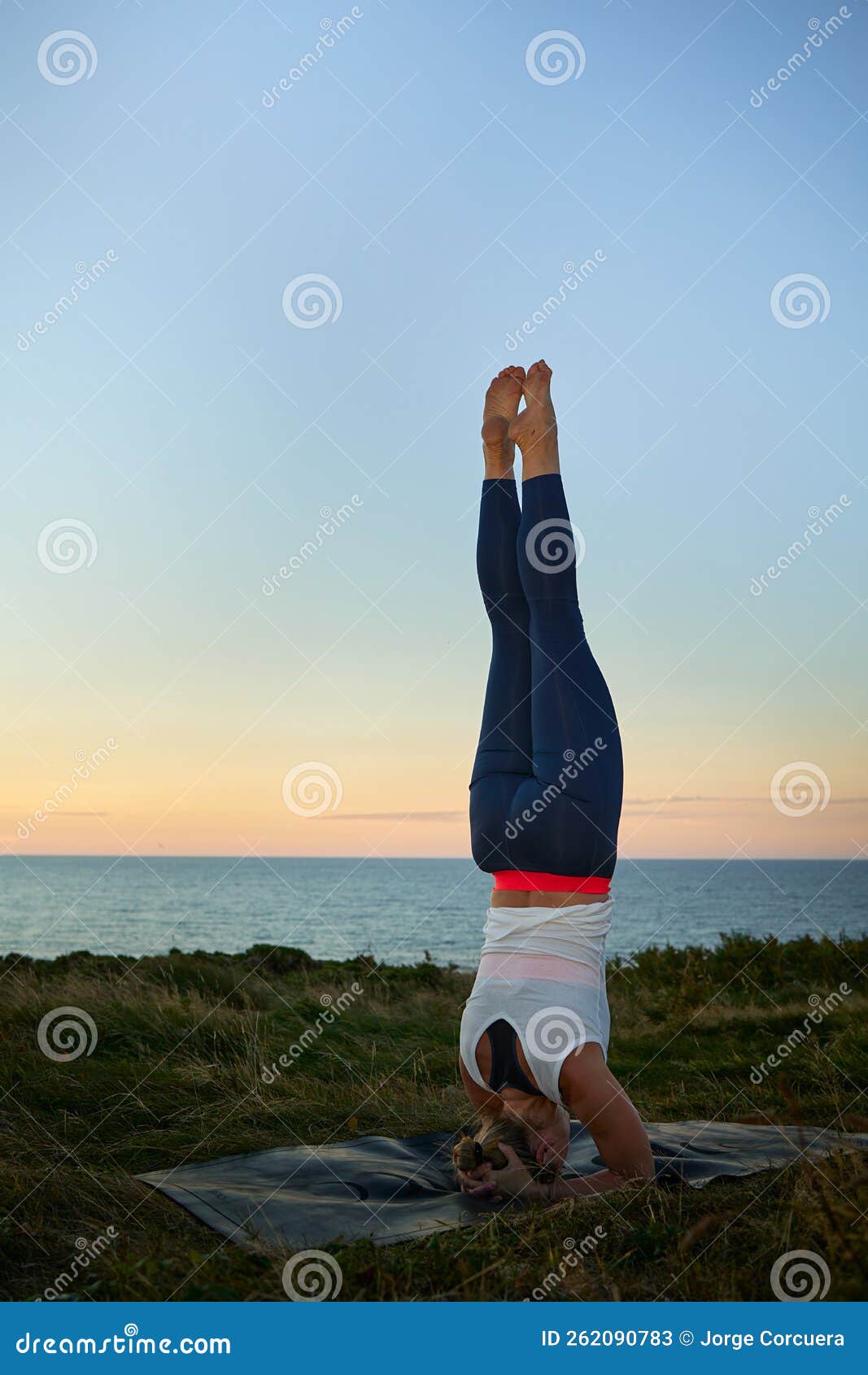 Inverted Yoga Pose of Woman Performing Yoga Stock Image - Image of ...