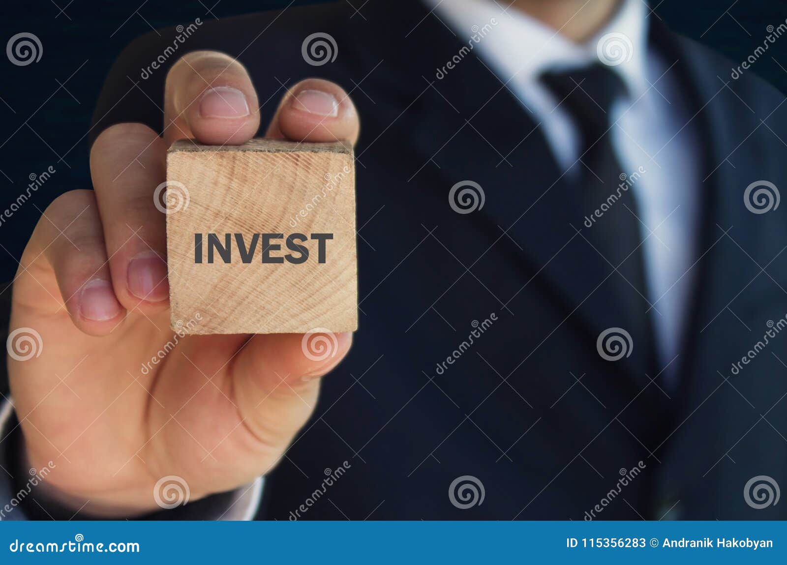 Invest Text on a Wood Cube. Stock Image - Image of message, success ...