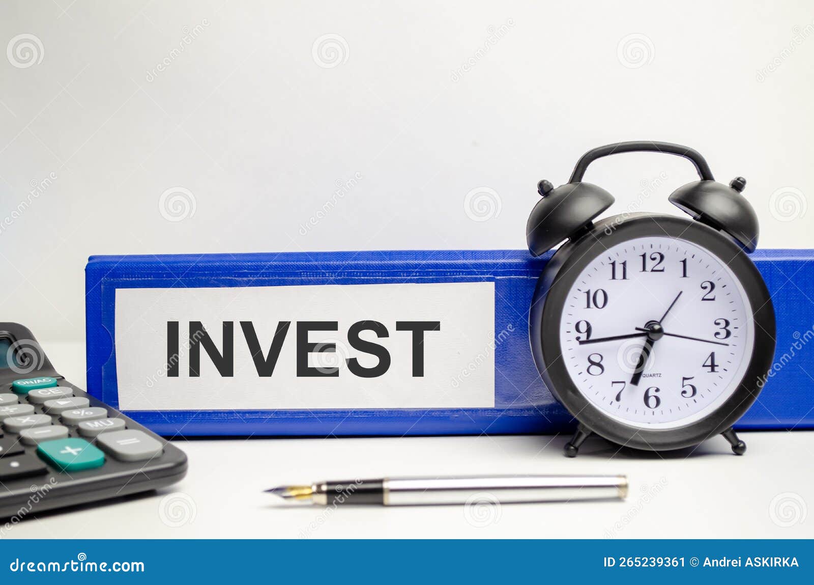 Invest Word on Paper Folder and Alarm Clock and Calculator Stock ...