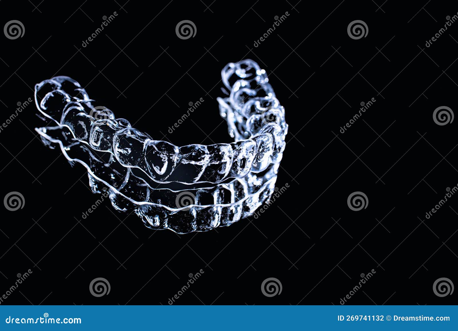 Invisible Aligners Teeth Retainers Lie on the Mirror Stock Photo ...