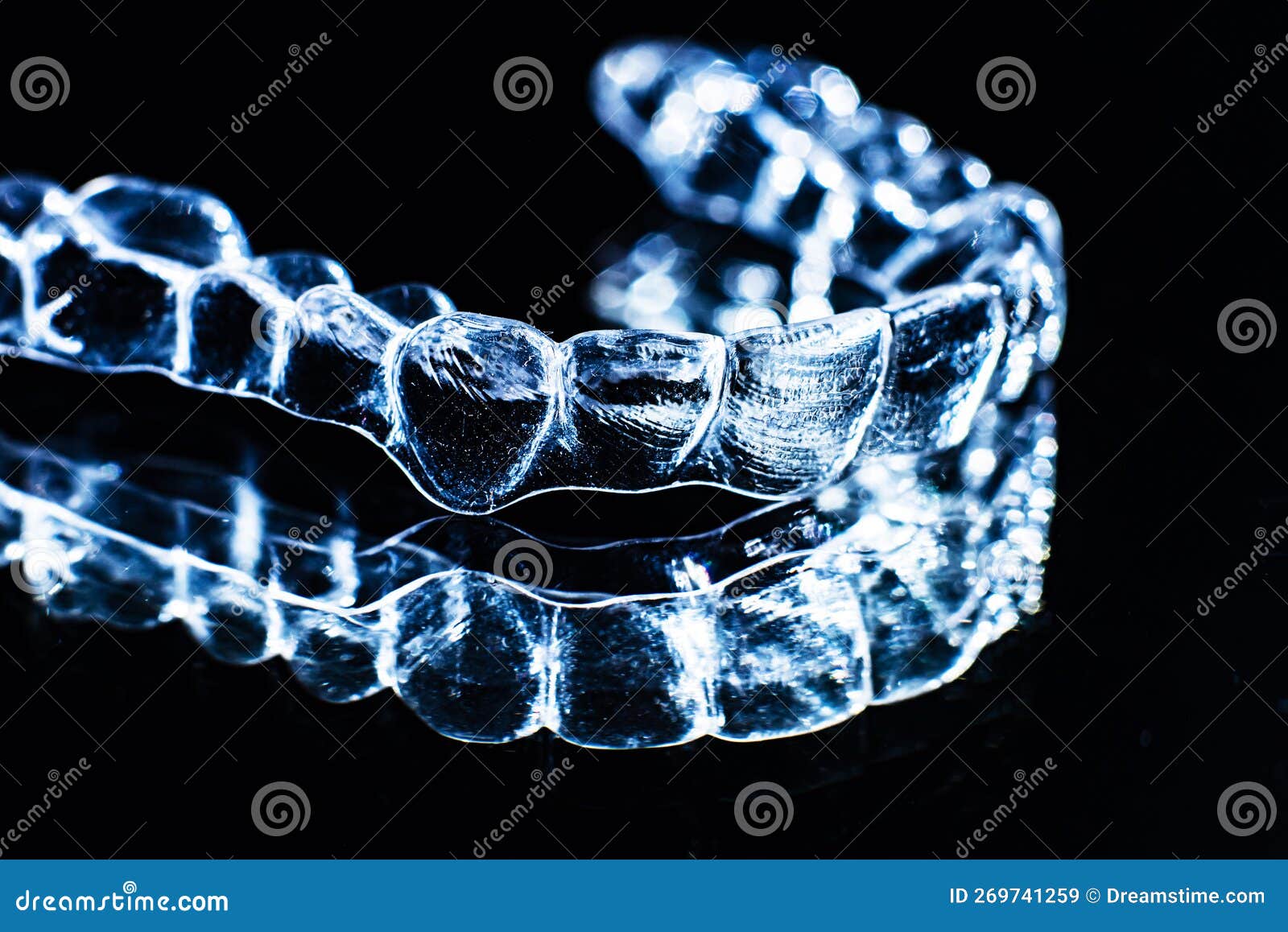Invisible Aligners Teeth Retainers Lie on the Mirror Stock Image ...