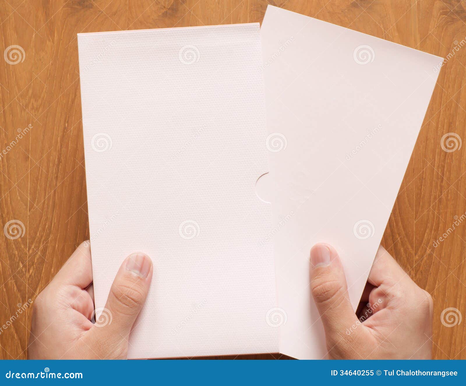 Invitation card in hand stock image. Image of invitation - 34640255