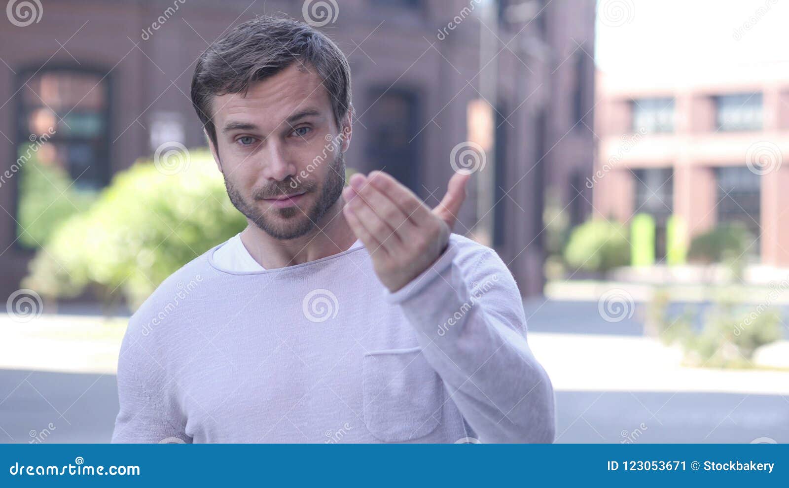 Inviting Gesture by Young Handsome Man Stock Image - Image of office ...