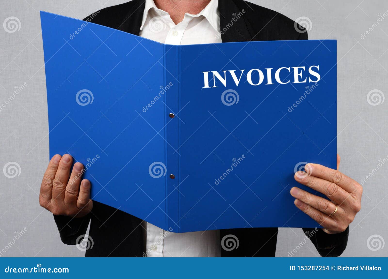 Invoices folder in hand stock photo. Image of accountant - 153287254