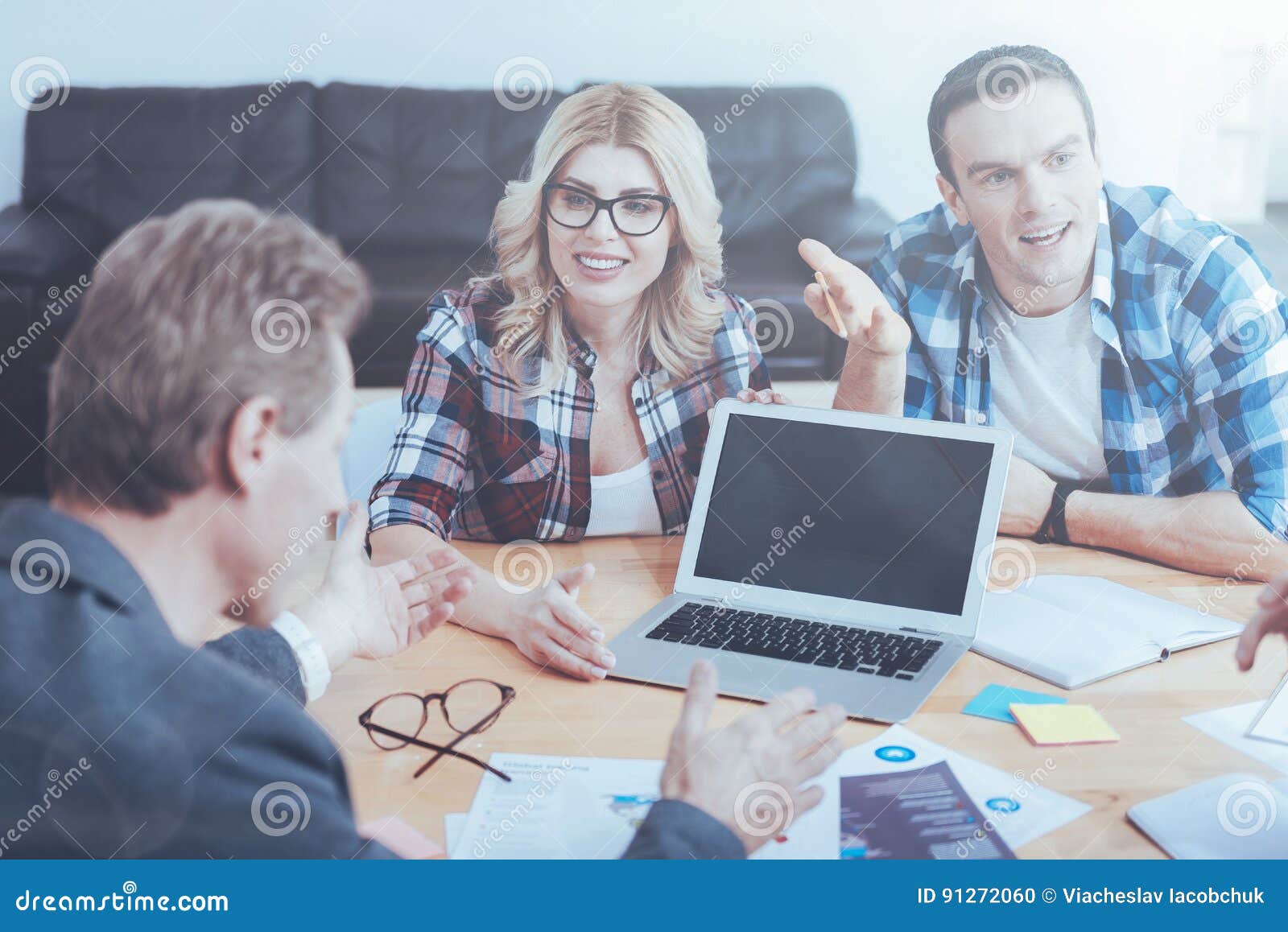 Involved Professioanl Colleagues Discussing New Contract Stock Photo ...