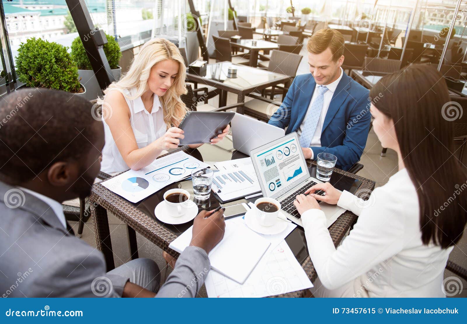 Involved Professional Colleagues Sitting at the Table Stock Image ...