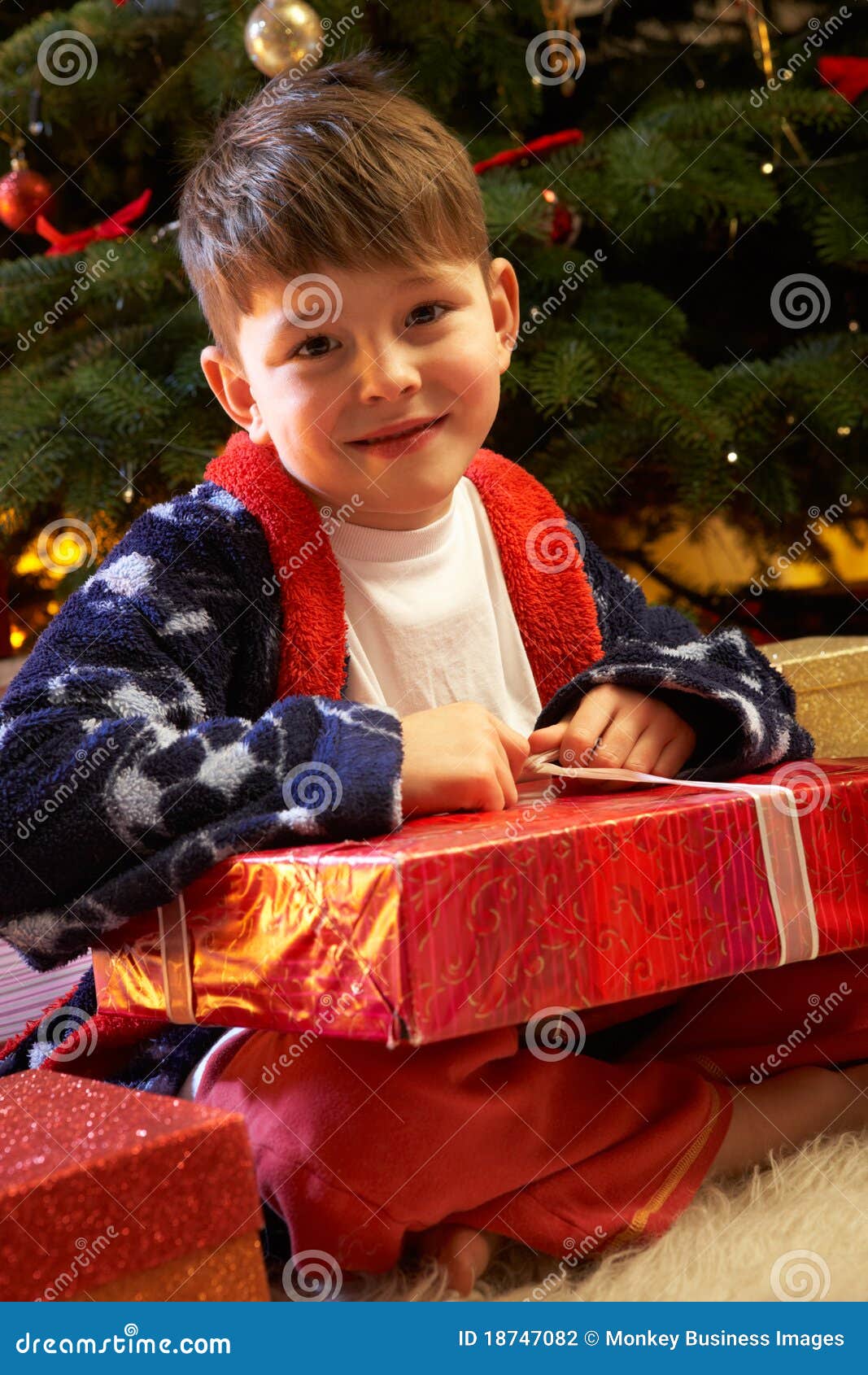 InYoung Boy Opening Christmas Presents Stock Photo - Image of home ...