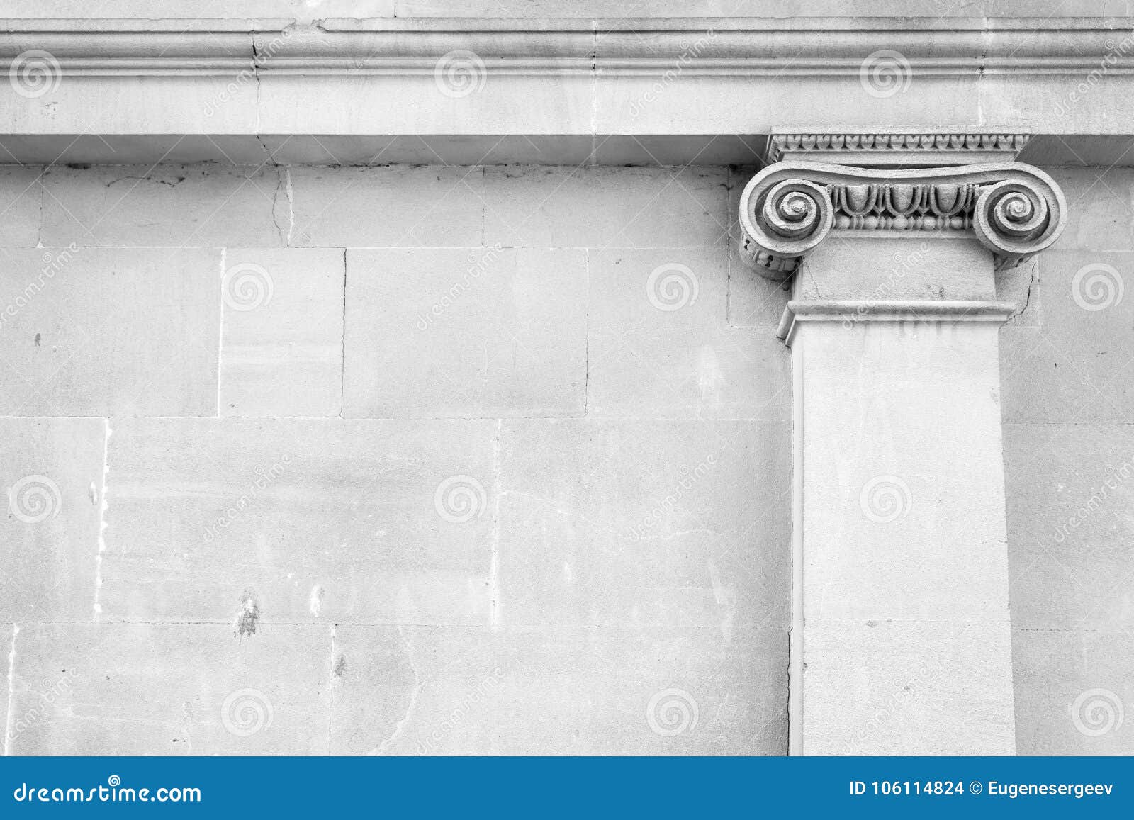 White False Column Capital Over Stone Wall Stock Photo - Image of stone ...