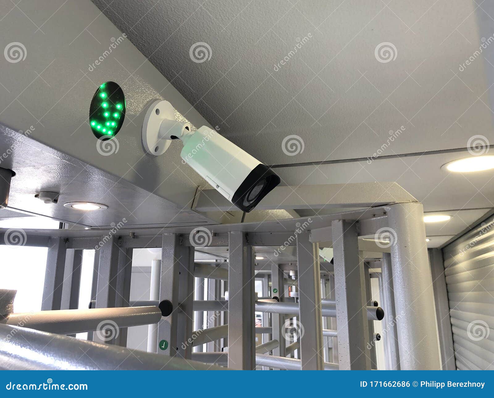 IP Camera and Green Arrow Indicator on Turnstile Stock Photo - Image of ...