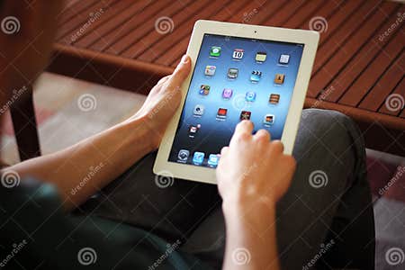 Ipad on hand editorial stock image. Image of network - 24713764