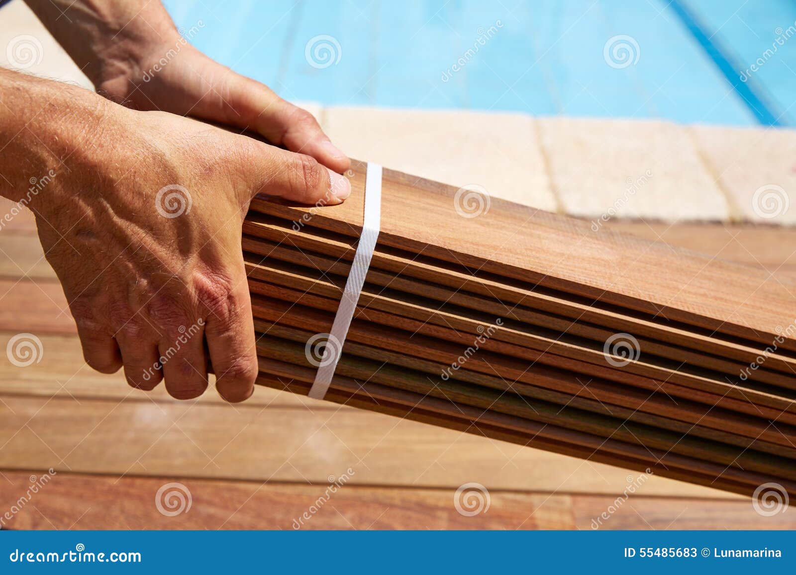 Ipe Deck Installation Carpenter Hands Holding Wood Stock Image - Image ...