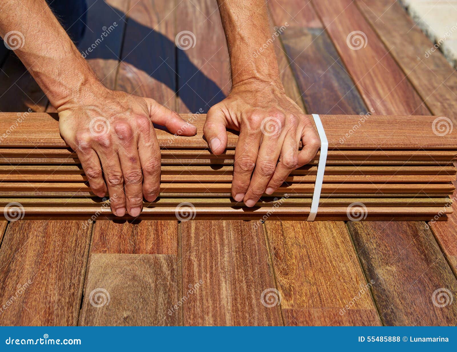 Ipe Deck Installation Carpenter Hands Holding Wood Stock Photo - Image ...
