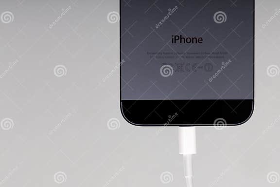 IPhone 5 Charging editorial stock photo. Image of white - 26741103