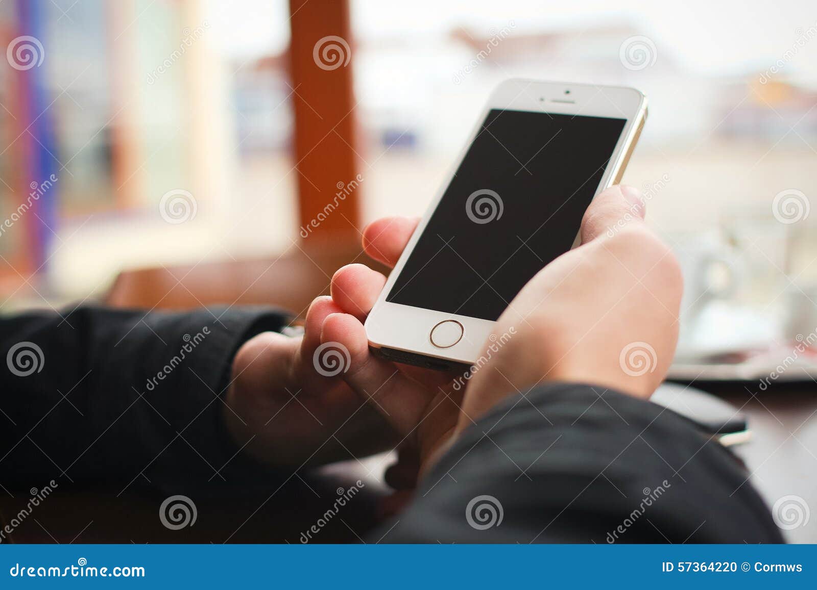 IPhone Being Held in a Hand Stock Photo - Image of digital, icon: 57364220