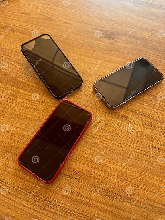 IPhone cell phone on table stock photo. Image of multimedia - 342363810