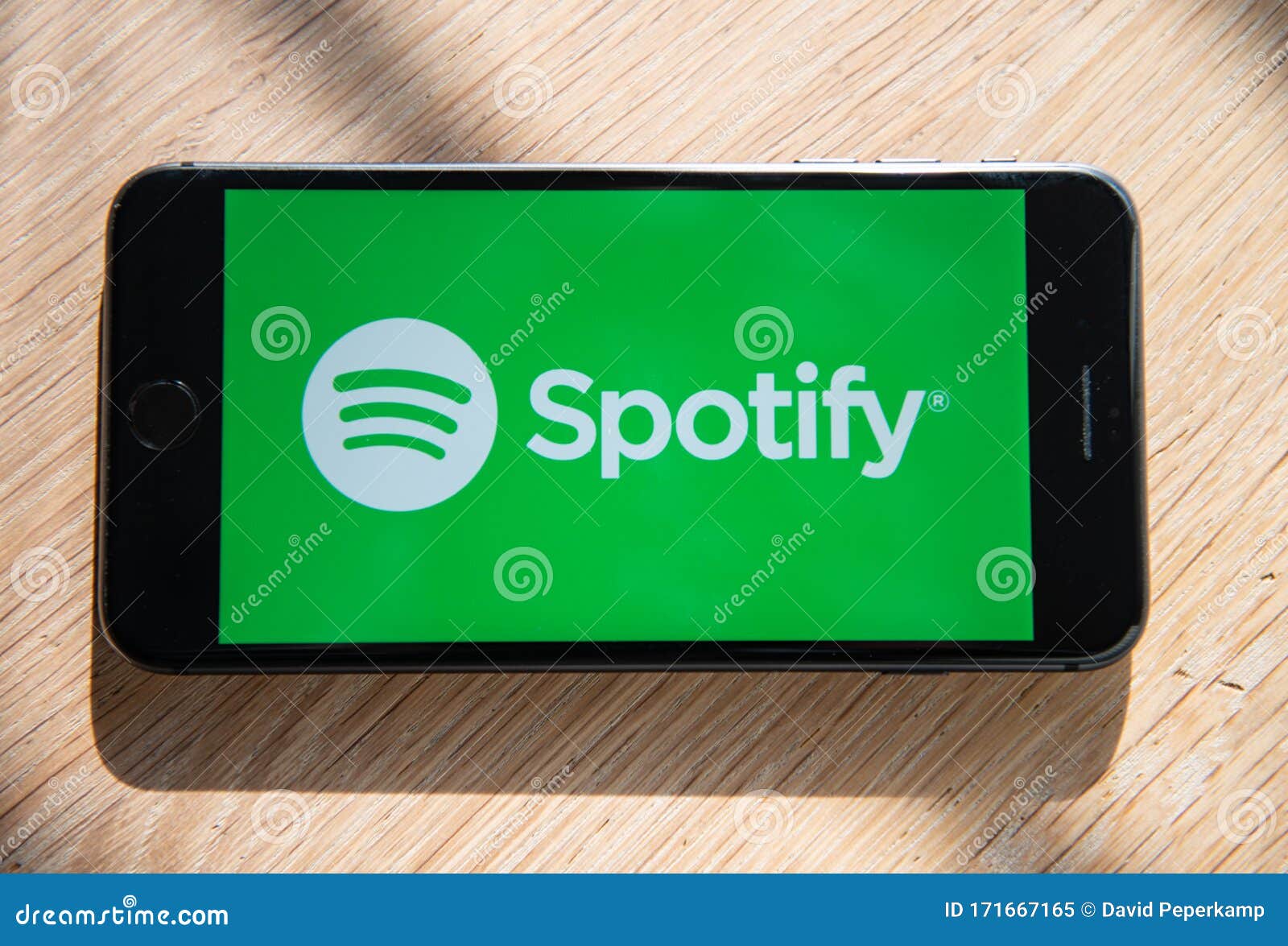 Iphone 8 Plus is on the Table, Spotify Start Screen on Smartphone ...