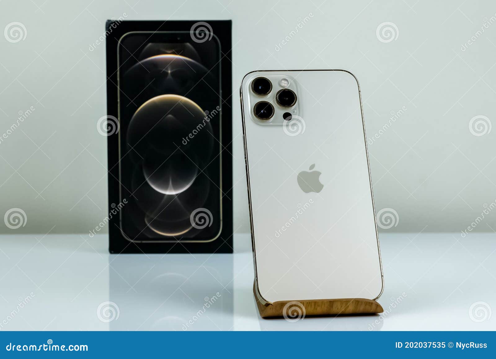 IPhone 12 Pro Max Gold Next To Its Box. Editorial Image - Image of ...