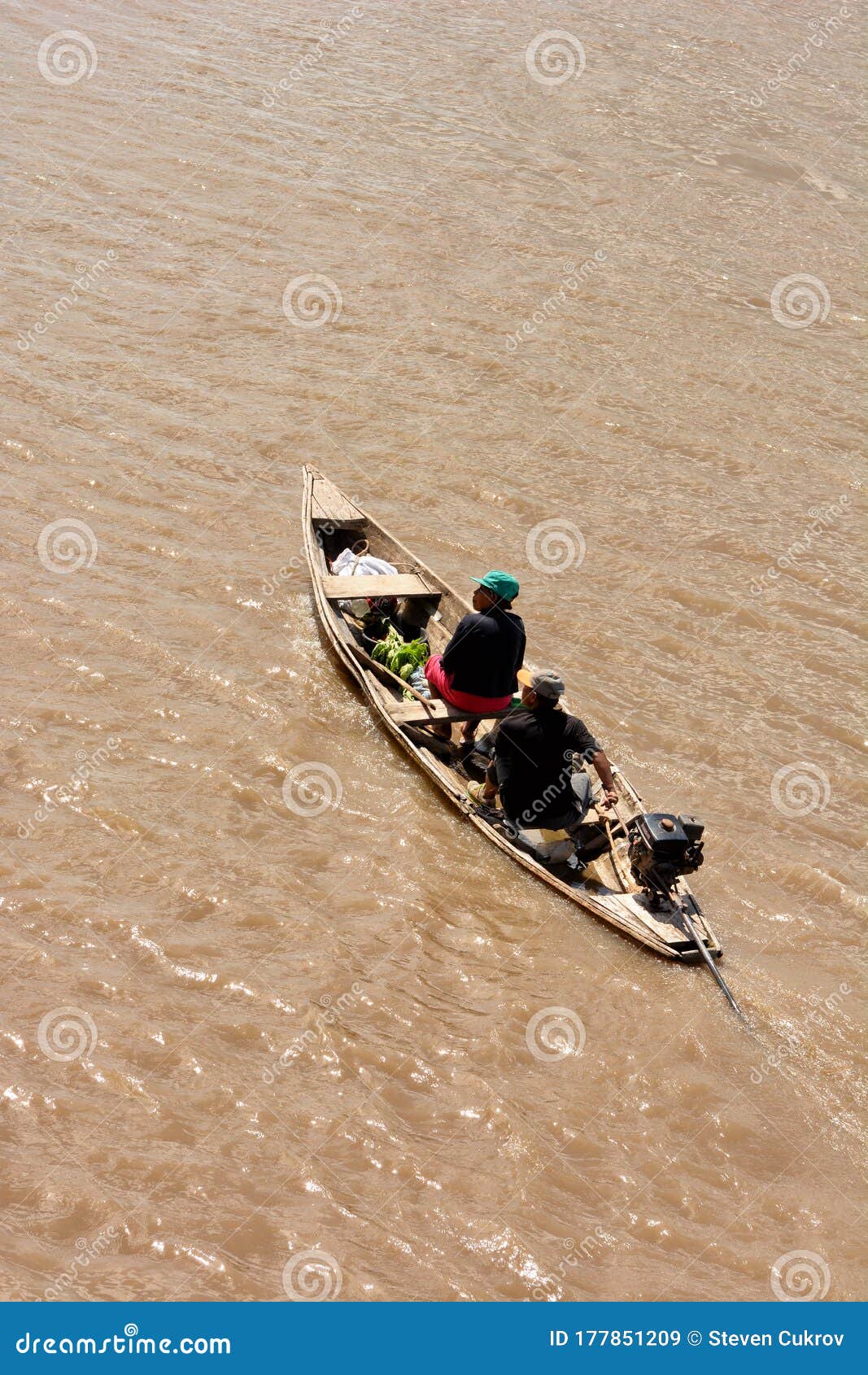 IQUITOS, PERU - 15 OCT 2015: Two People in Their Small Boat on the ...