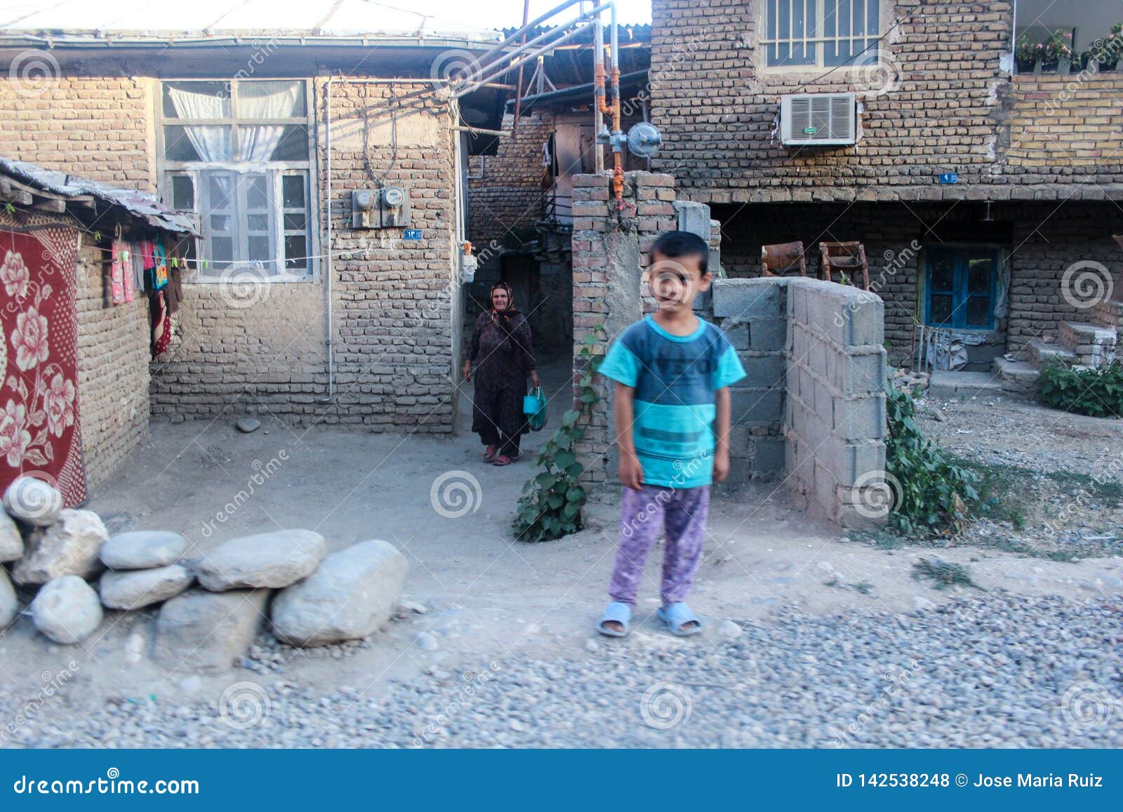 IranMazandaran, Iran - 19 July 2017: Iranian Kid in a Rural Area with ...