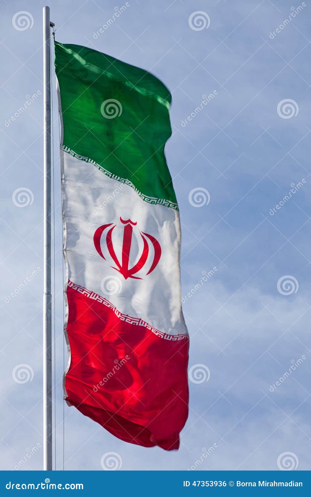 Iran Flag Waving in the Wind Against Blue Sky with Copy Space Stock ...
