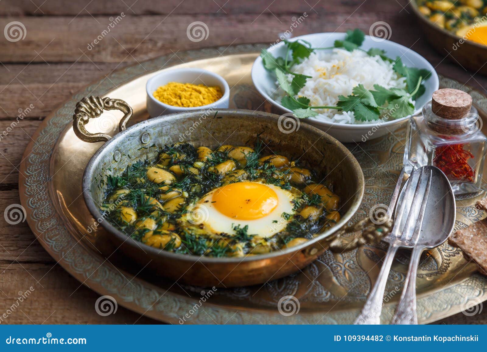 Iranian Breakfast Made with Eggs, Bean and Dill Stock Photo - Image of ...