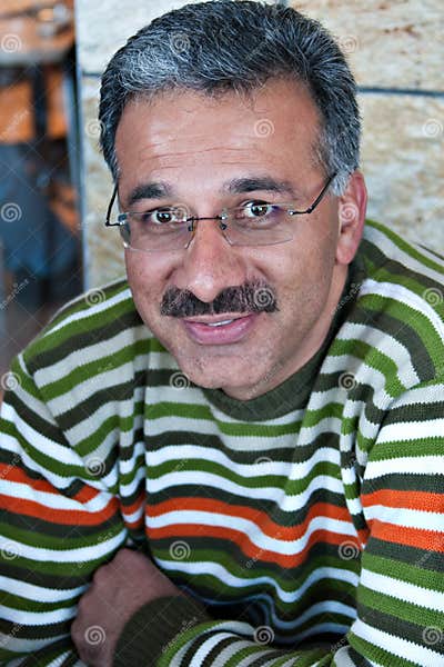 Iranian man stock image. Image of relaxed, green, casual - 10287587